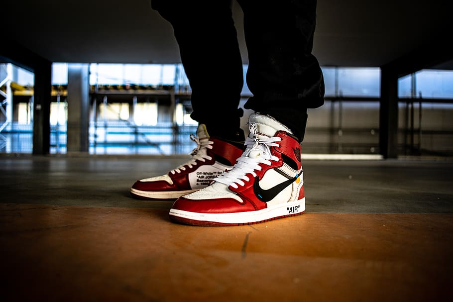 Person Wearing White Red And Black Nike X Off White- WallpaperUse