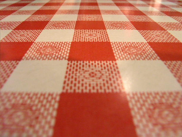 A Classic Red And White Checkered Table Top In An Italian - White And ...