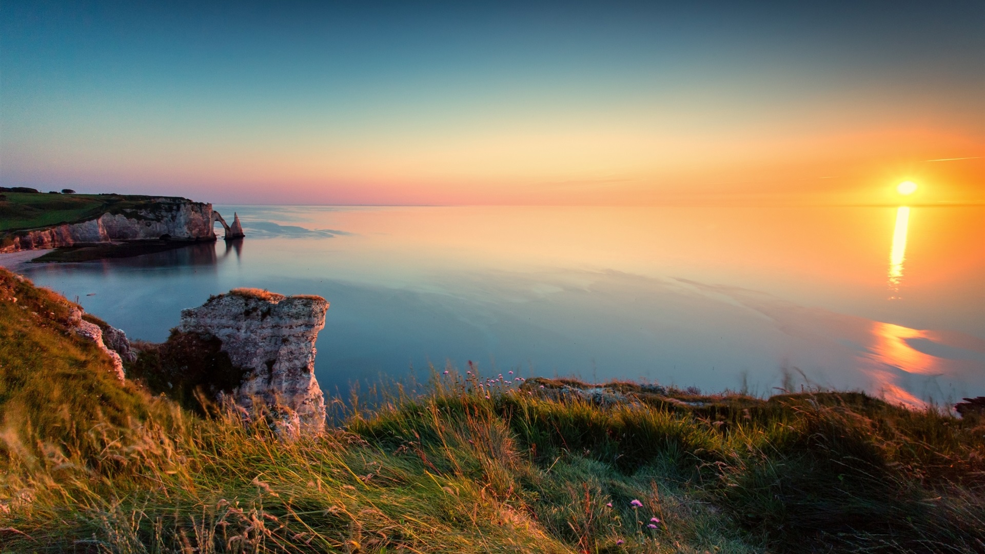Sunset Over A Cliff- WallpaperUse